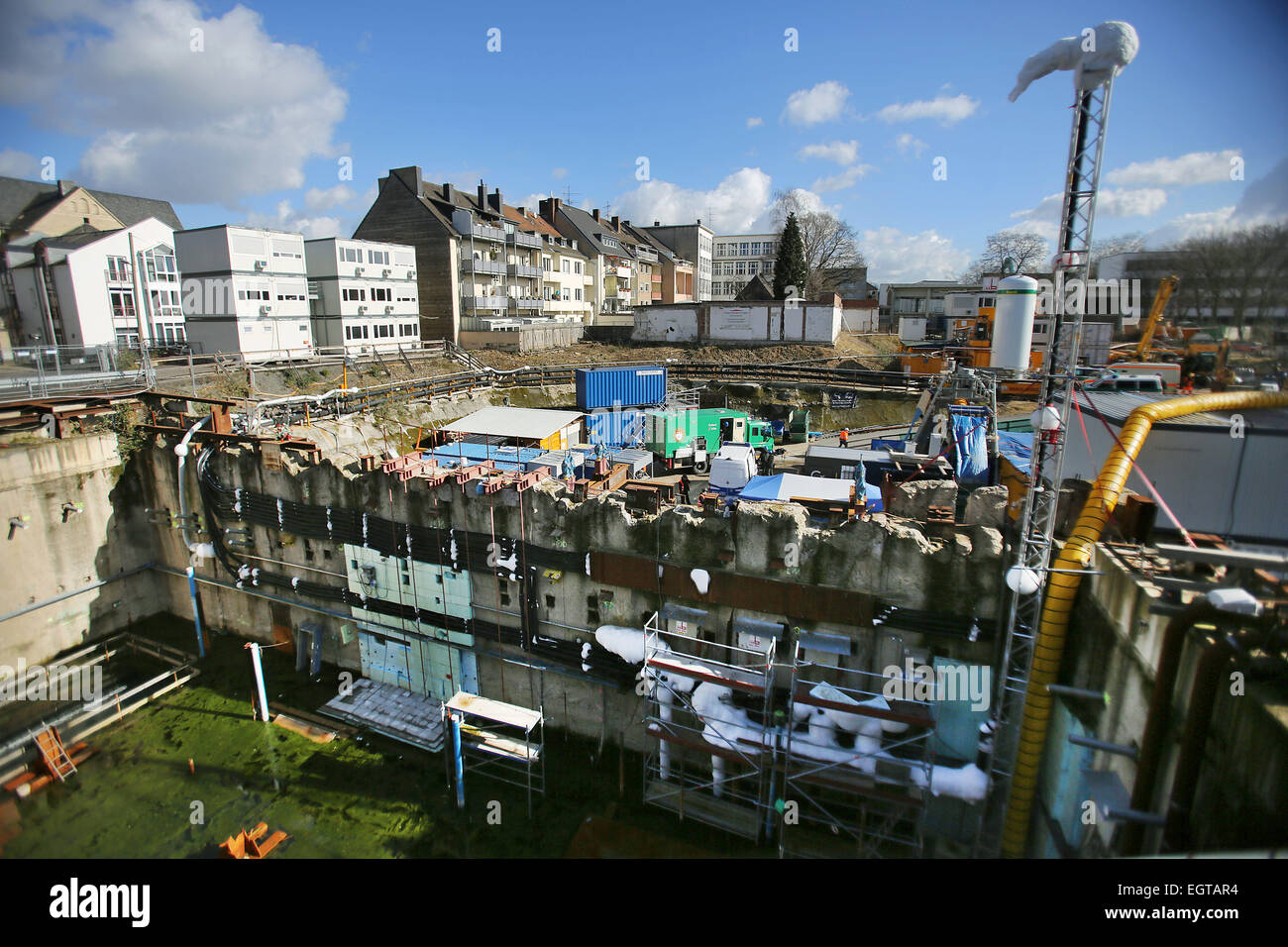 Police officers and engineers work on the sight of the collapse of the ...