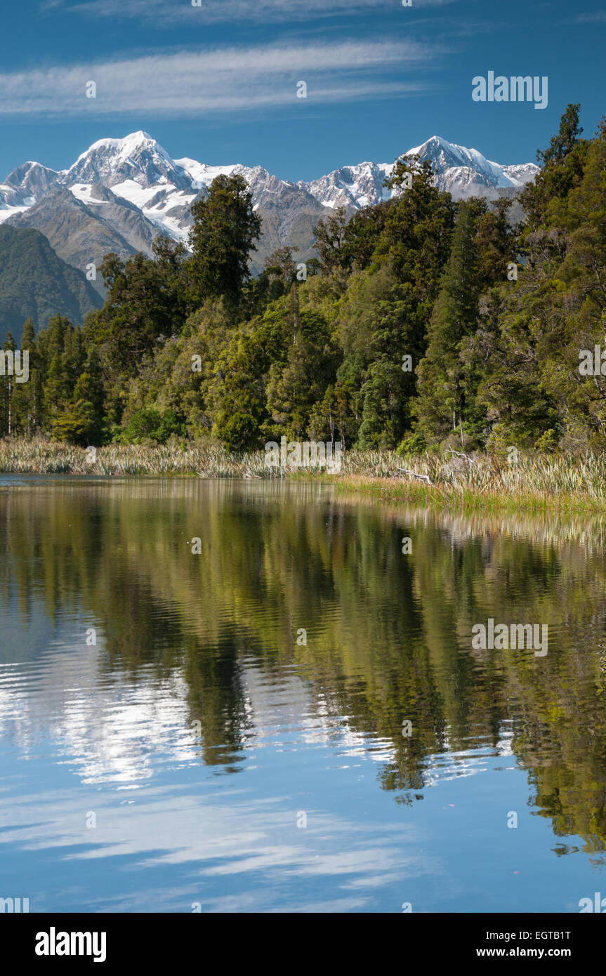 Lake Matheson, Mount Cook, right, and Mount Dampier, Southern Alps ...