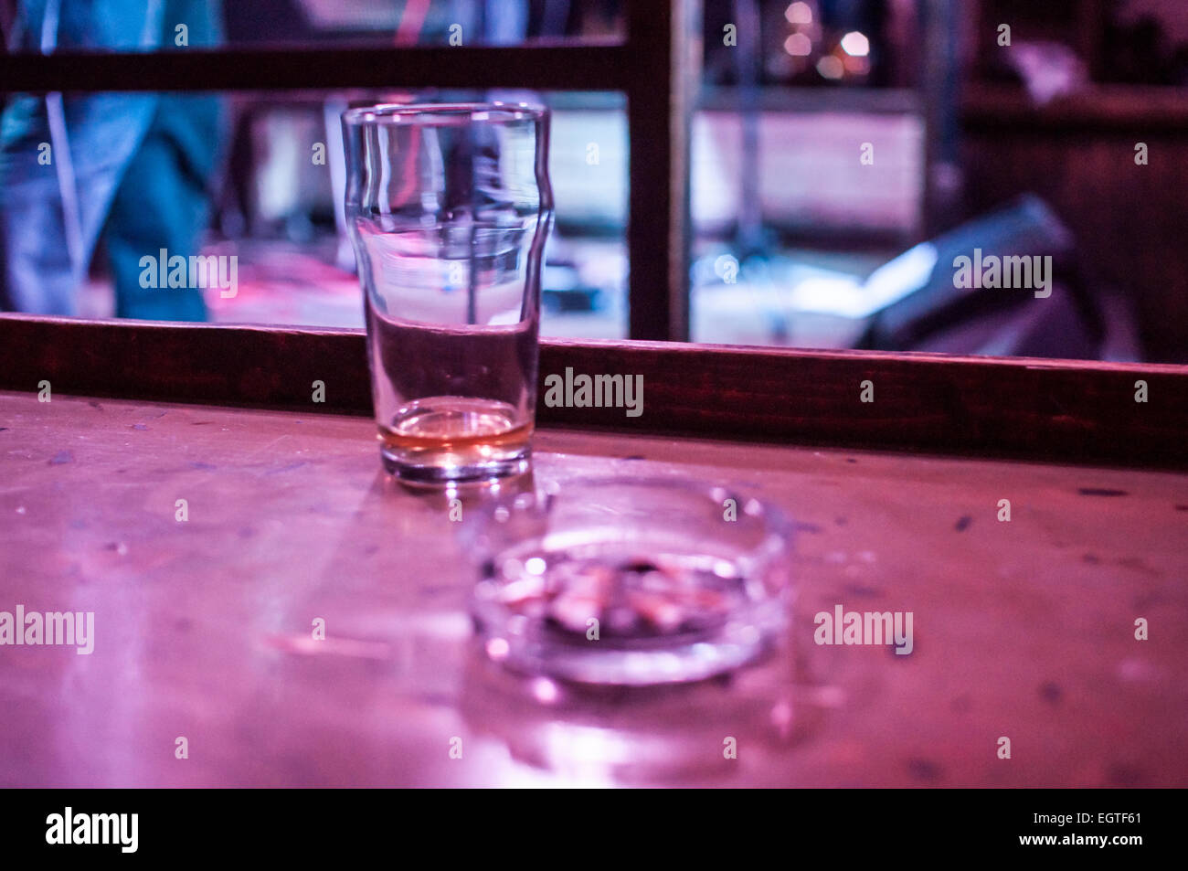 glass and an ashtray on the table Stock Photo - Alamy