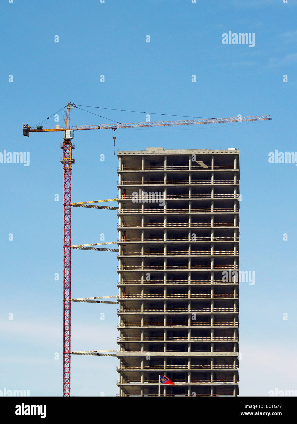 Crane and construction of a building Stock Photo - Alamy