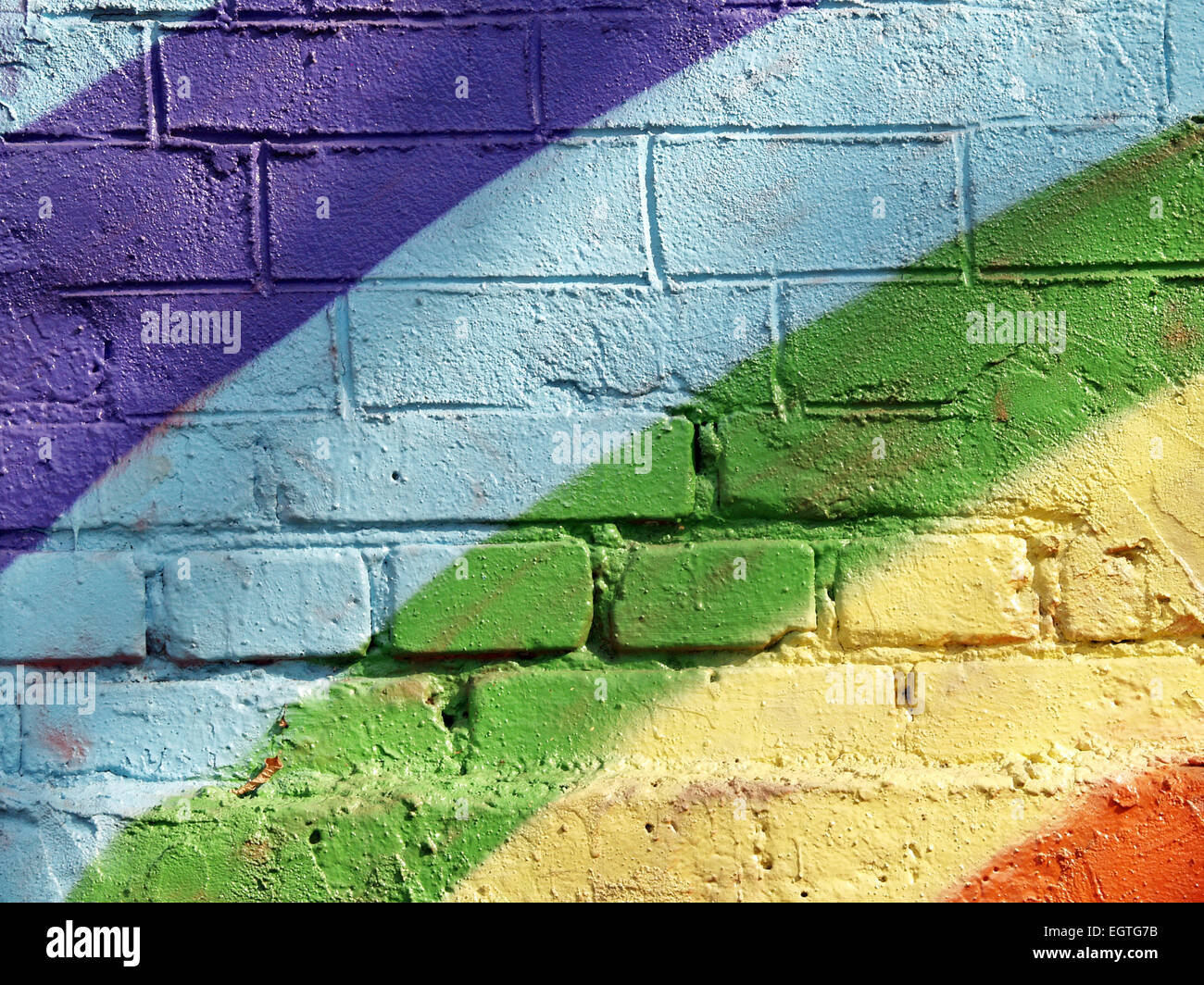 Rainbow brick wall Stock Photo - Alamy