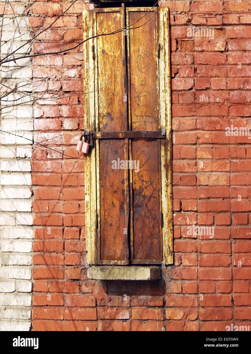 Window with rusty iron shutter in old brick wall Stock Photo - Alamy