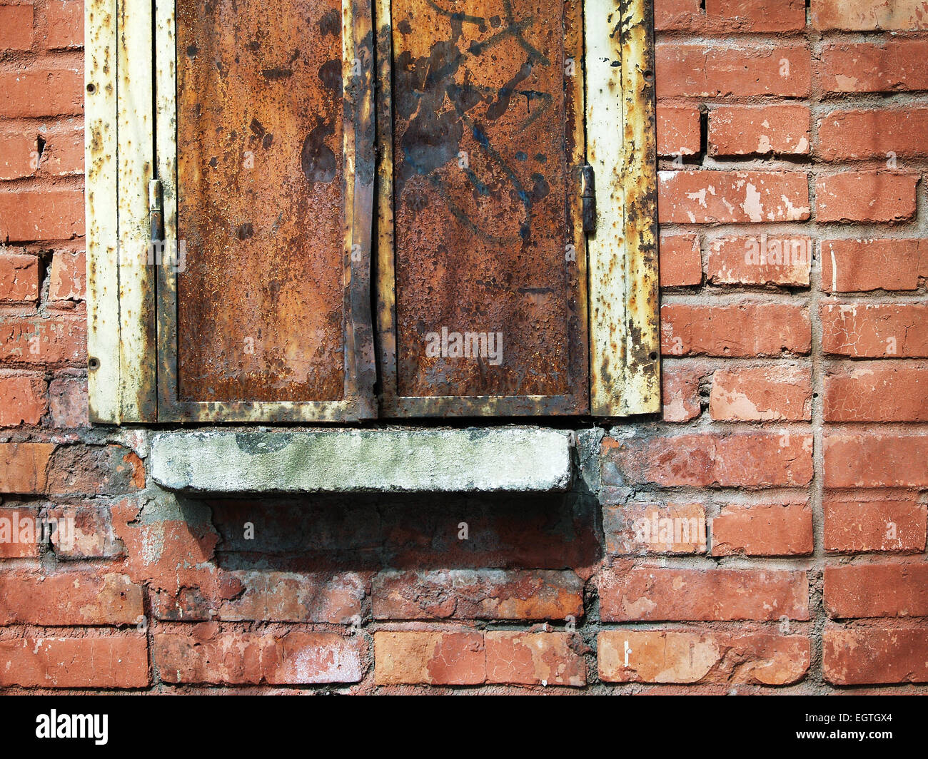 Window with rusty iron shutters in old brick wall Stock Photo - Alamy
