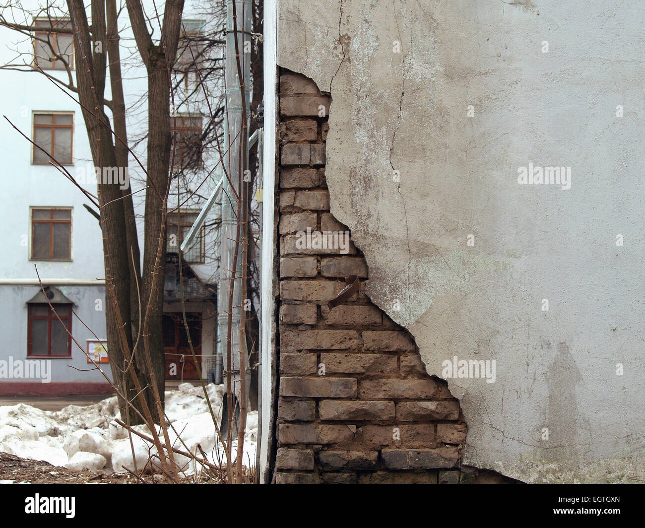 City corner with brick wall Stock Photo - Alamy