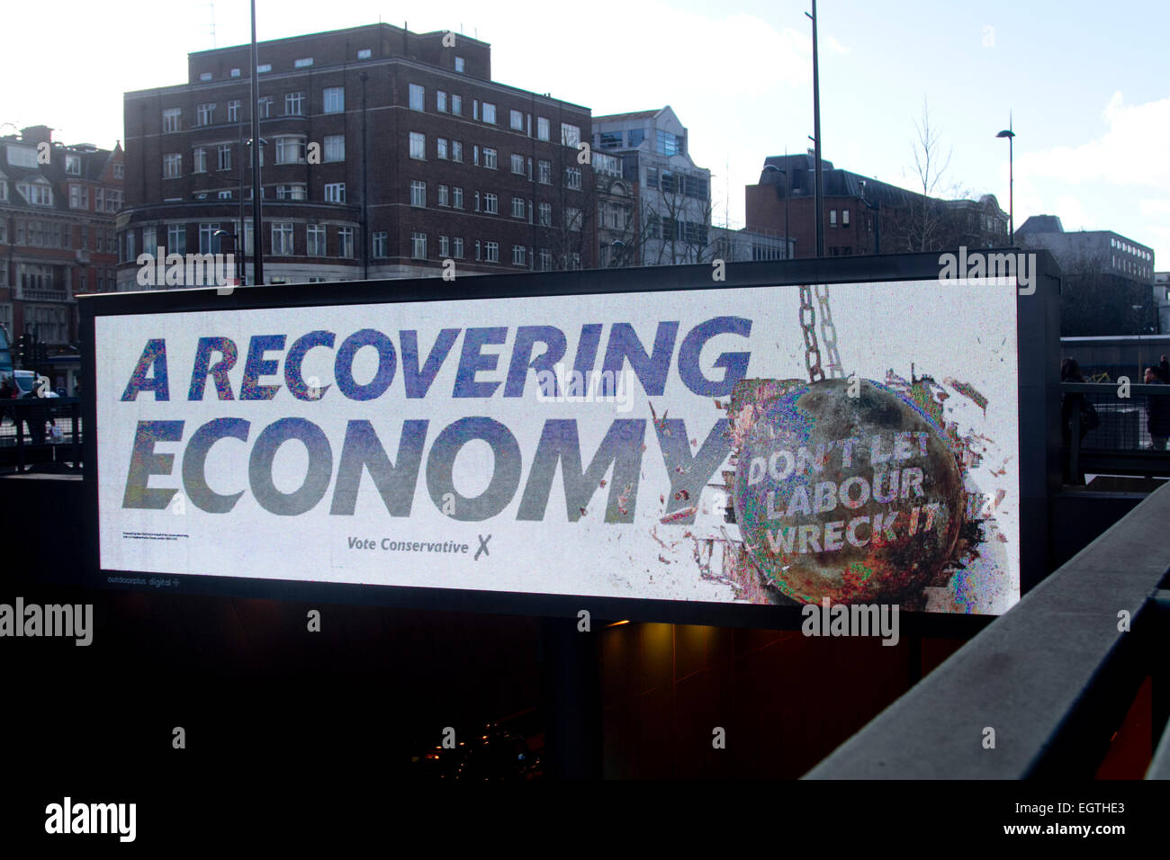 London, UK. 2nd March, 2015. An electronic board flashes a campaign ...