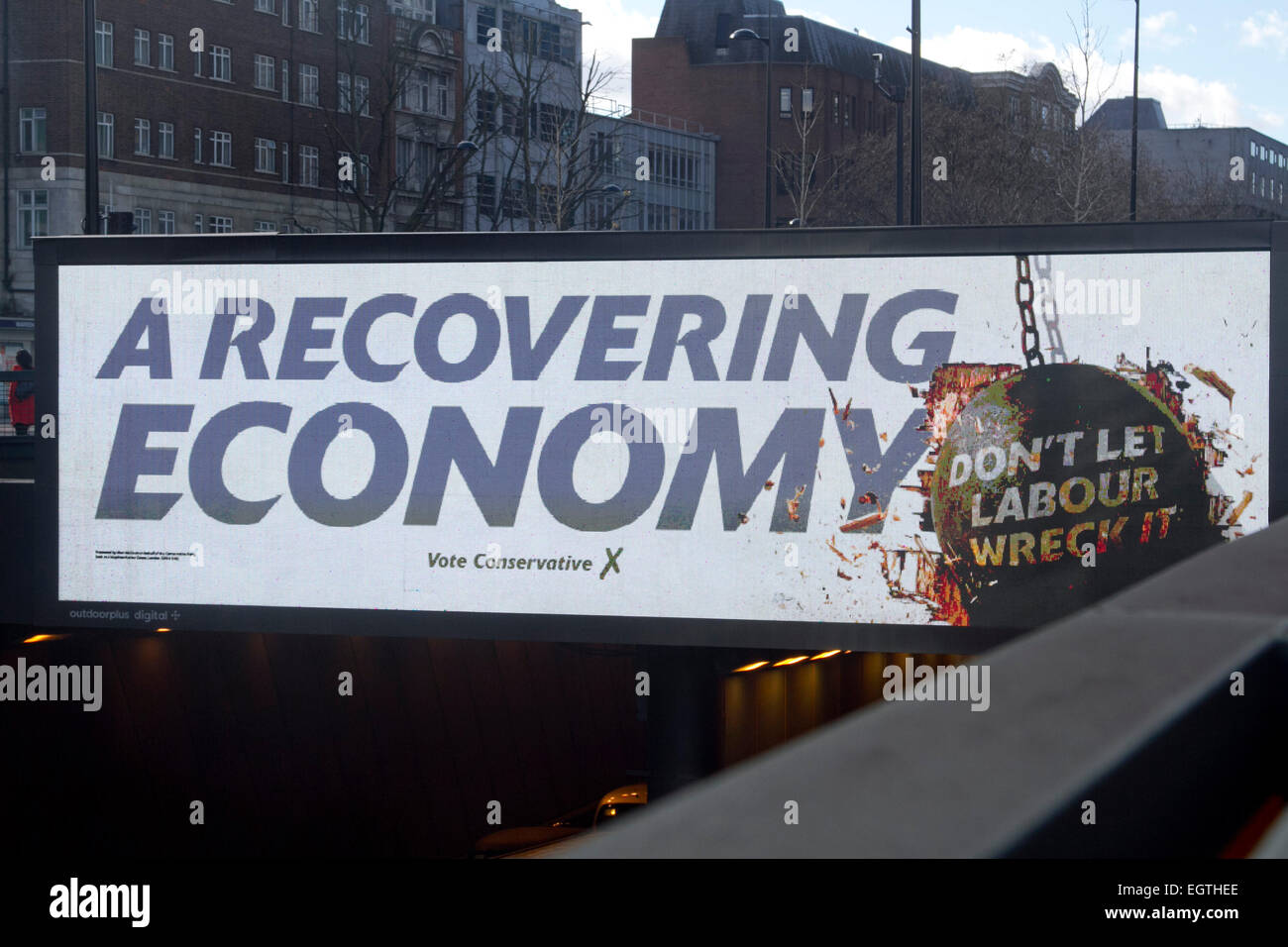 London, UK. 2nd March, 2015. An electronic board flashes a campaign ...