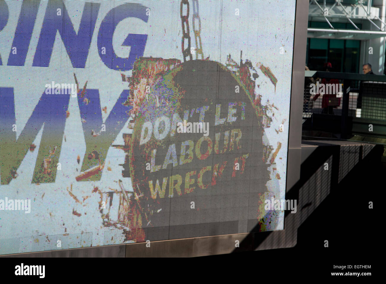 London, UK. 2nd March, 2015. An electronic board flashes a campaign ...