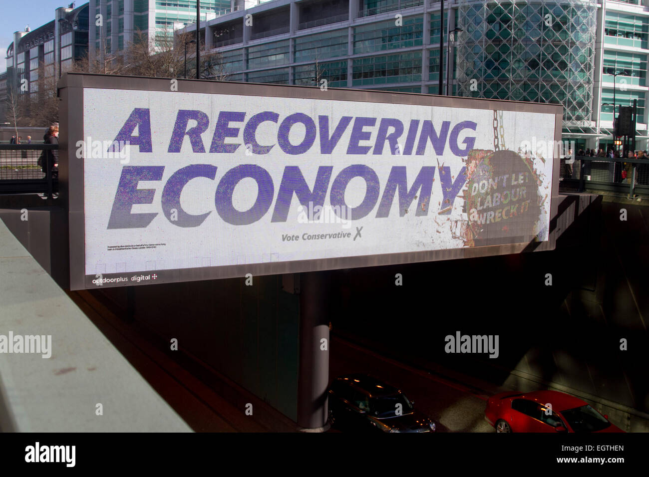 London, UK. 2nd March, 2015. An electronic board flashes a campaign ...