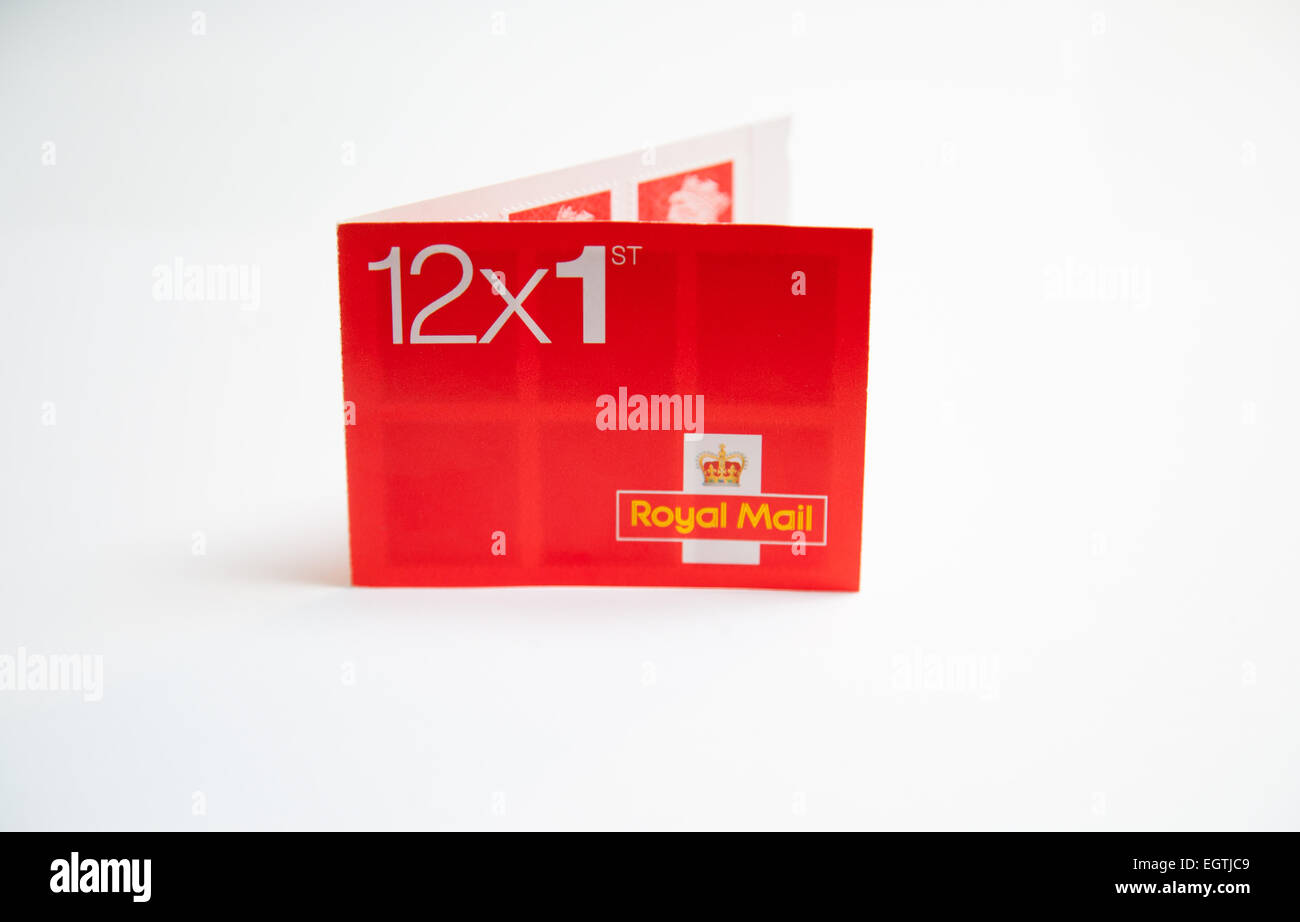 A book of UK First 1st Class stamps Stock Photo - Alamy