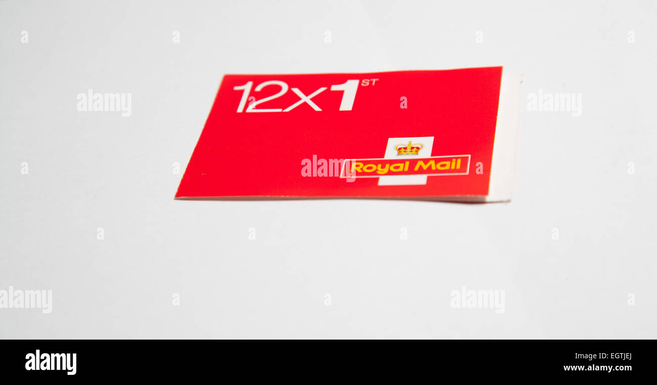 A book of UK First 1st Class stamps Stock Photo - Alamy