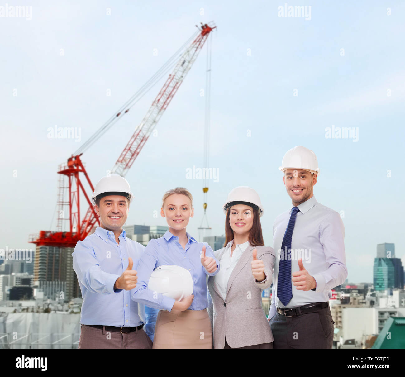group of smiling businessmen in white helmets Stock Photo - Alamy
