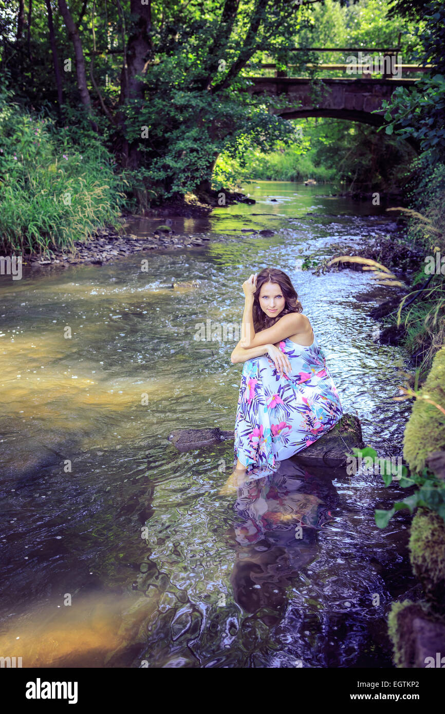 portrait of a young woman in a river Stock Photo - Alamy