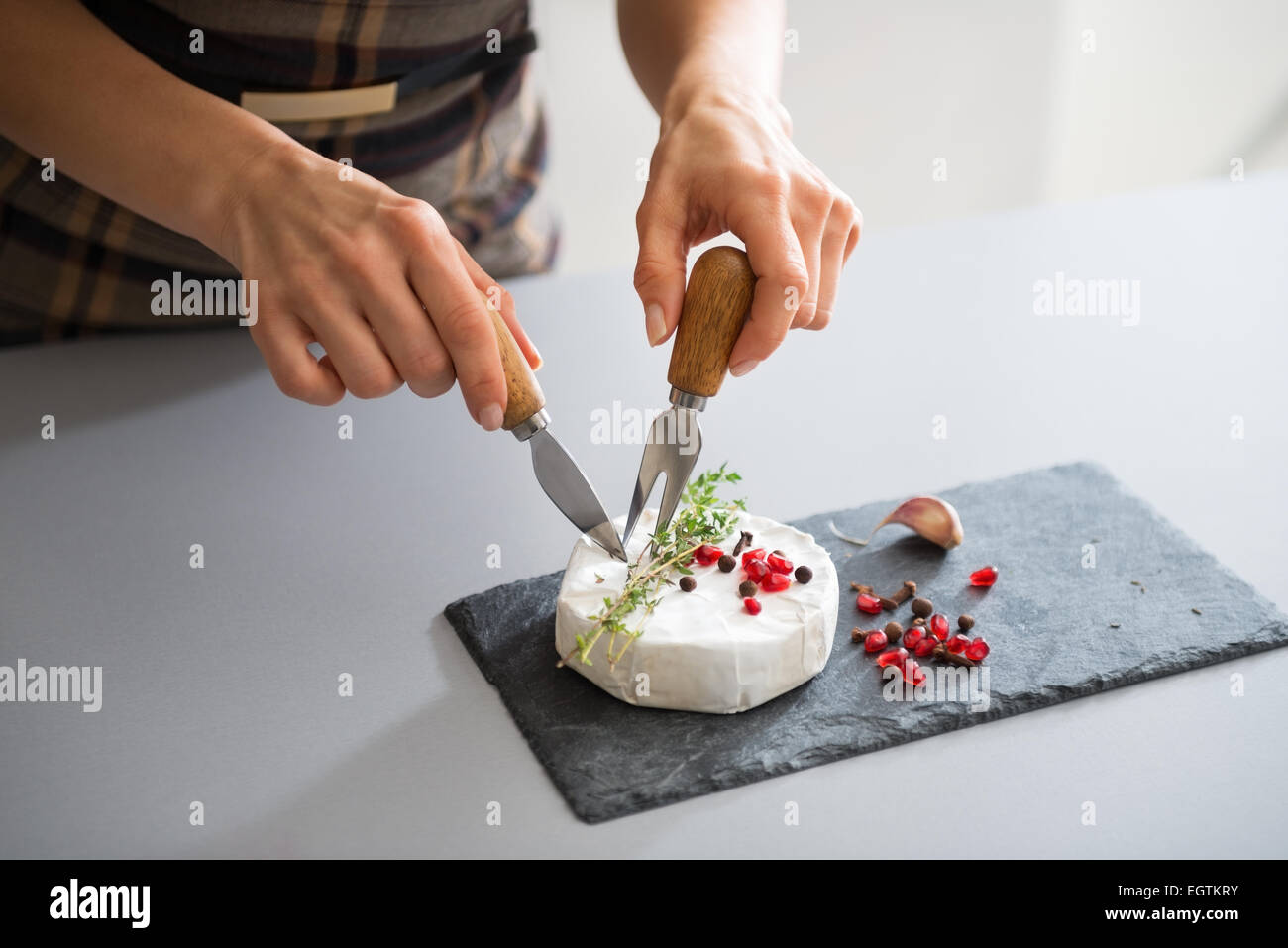 Woman eating camembert hi-res stock photography and images - Alamy
