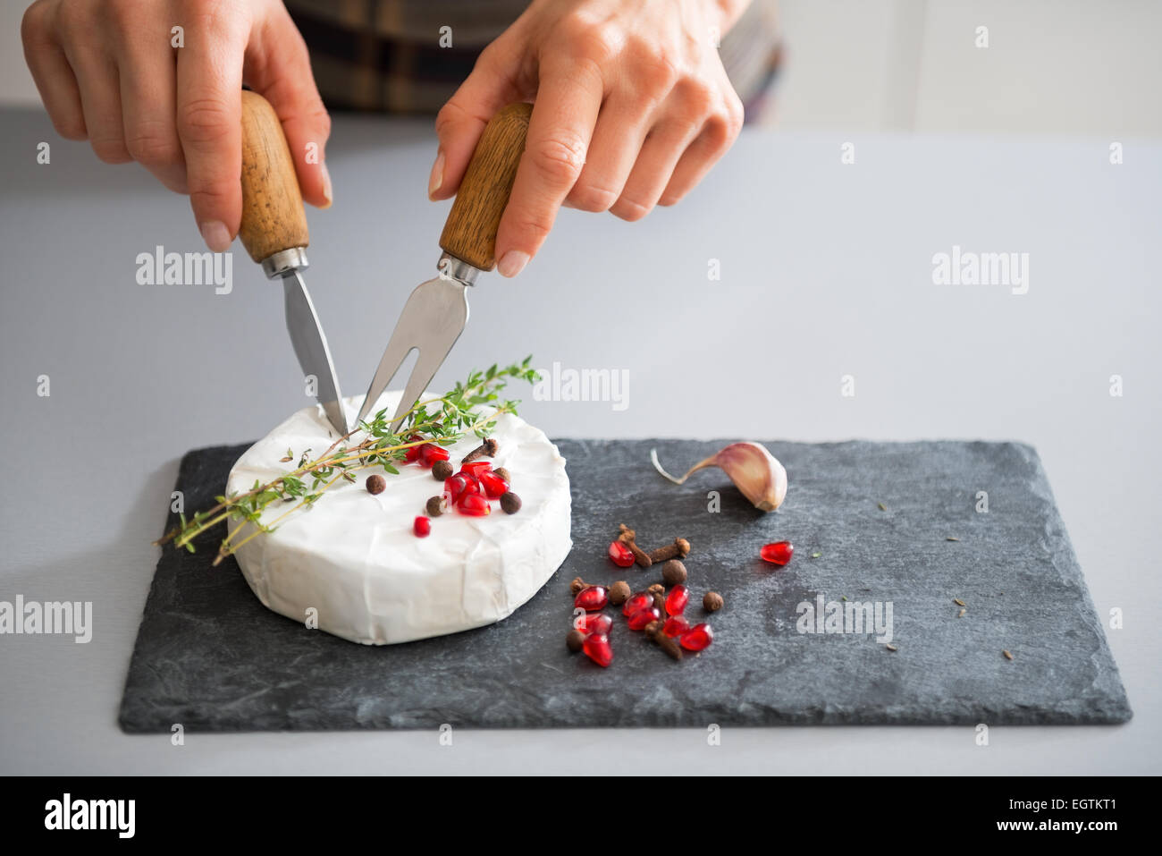Woman eating camembert hi-res stock photography and images - Alamy