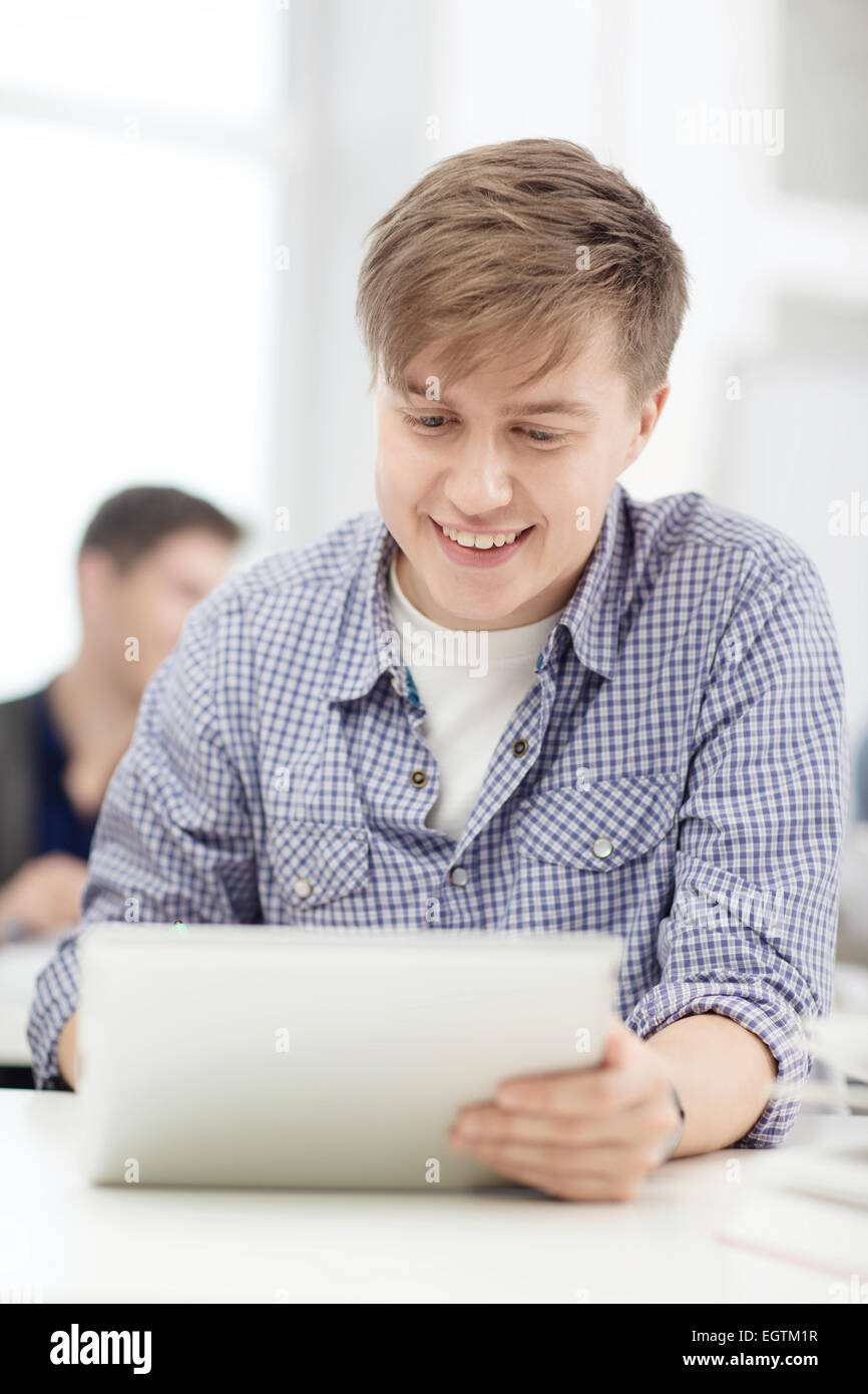 smiling teenage student with tablet pc computer Stock Photo - Alamy