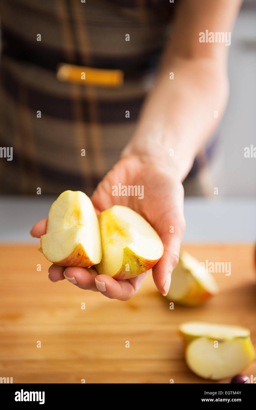 Woman cutting apple on slices hi-res stock photography and images - Alamy