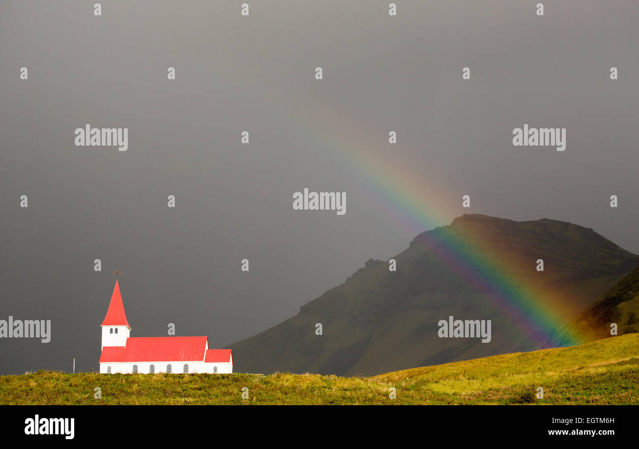 Rainbow over vik church hi-res stock photography and images - Alamy