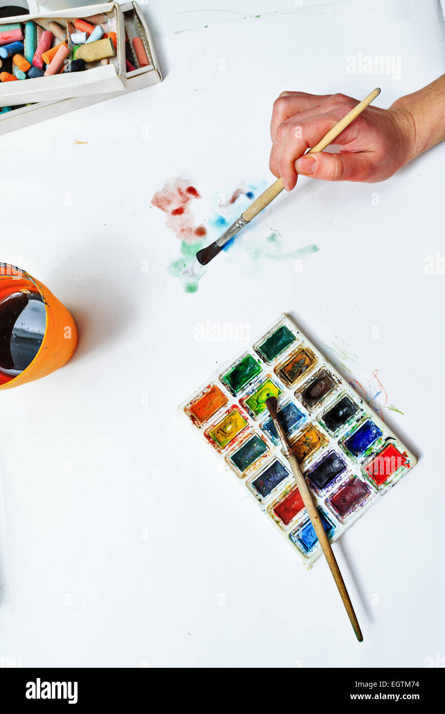 Artist's hand draw watercolor Stock Photo - Alamy
