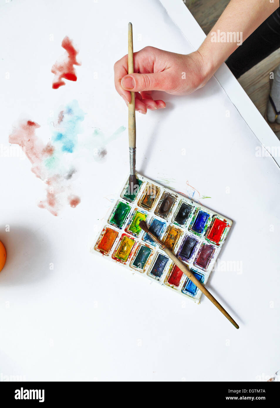 Artist's hand draw watercolor Stock Photo - Alamy