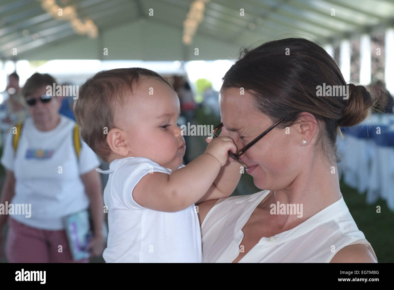 Georgina Bloomberg and son Jasper attend the Hampton Classic Horseshow ...