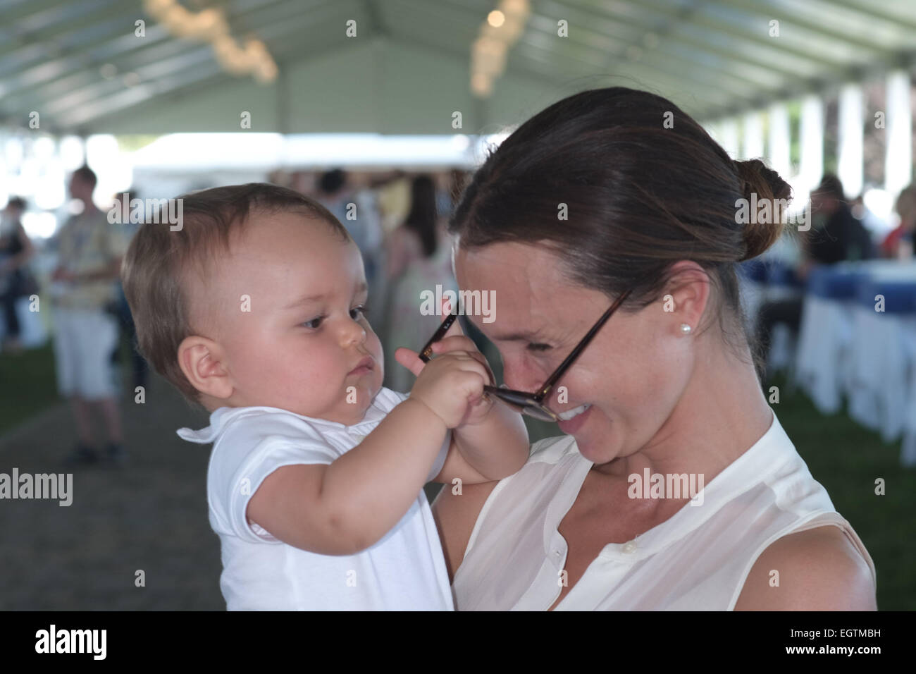 Georgina Bloomberg and son Jasper attend the Hampton Classic Horseshow ...