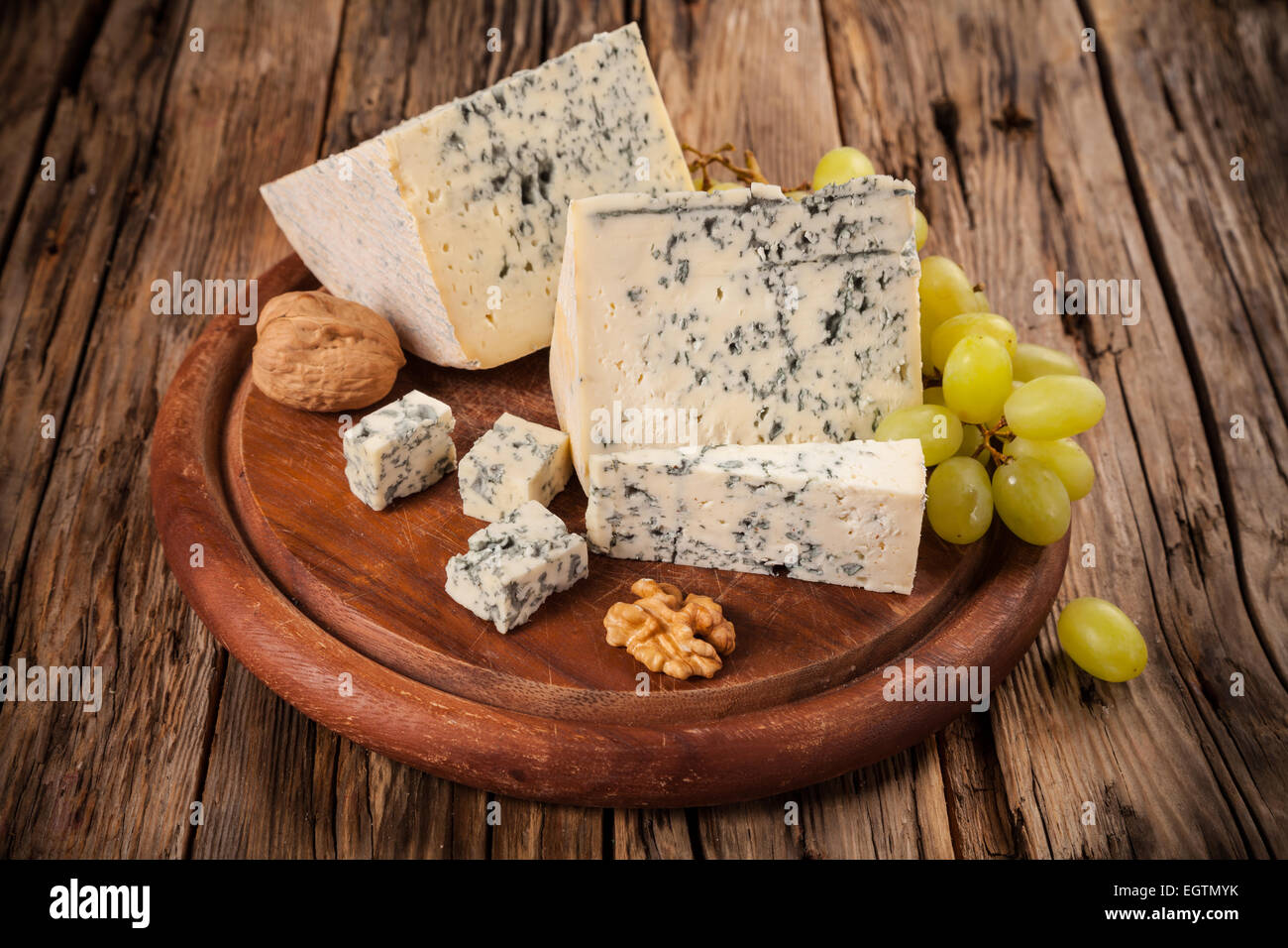 Round cheese slice blue hi-res stock photography and images - Alamy
