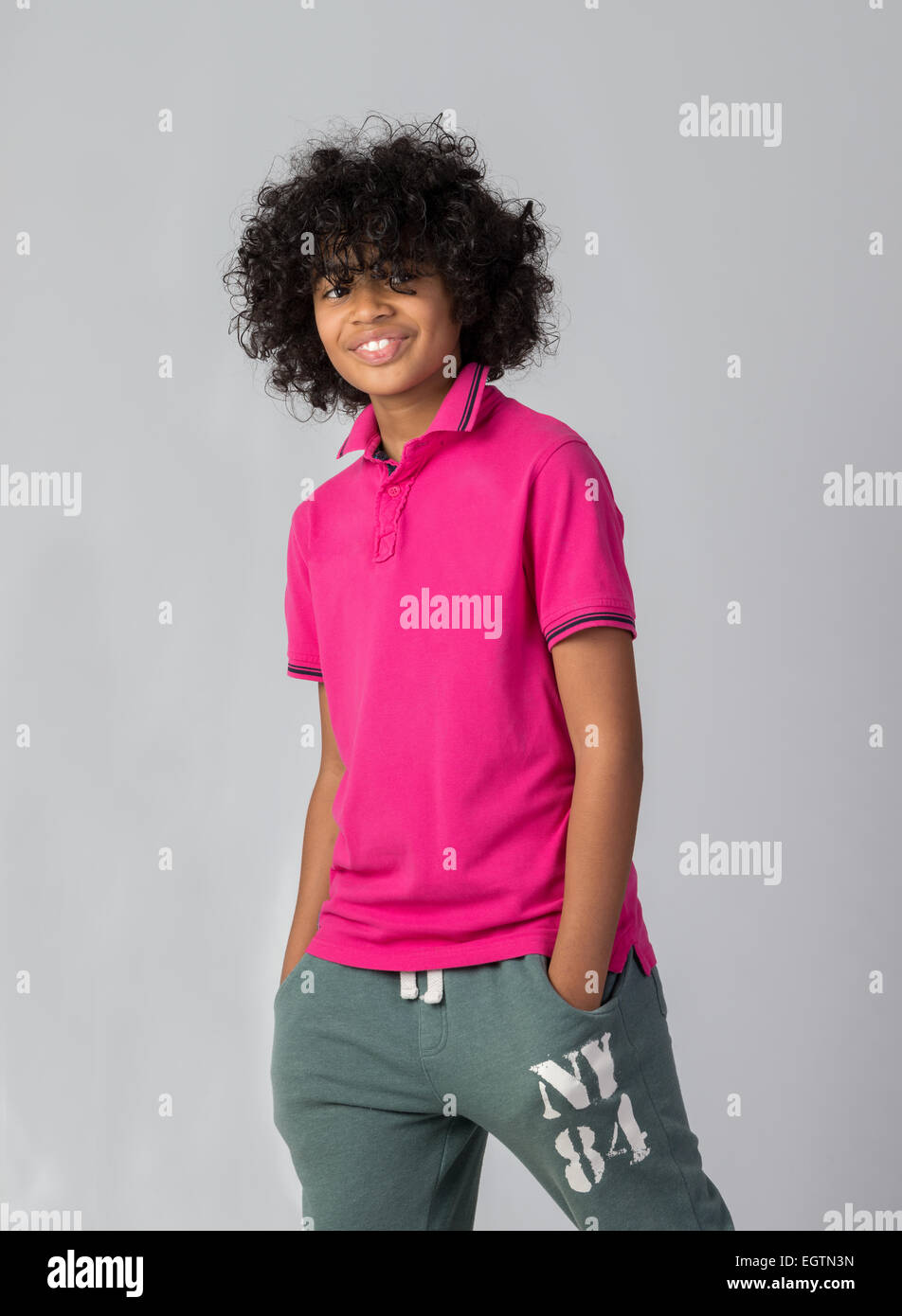 Happy African Decent Child with Afro Hair Style Stock Photo - Alamy