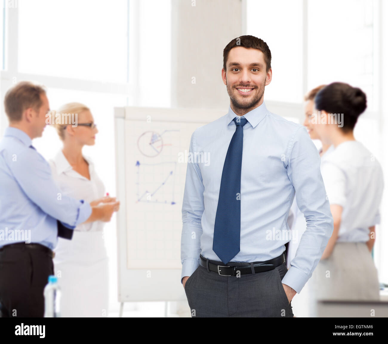 group of smiling businessmen with smartboard Stock Photo - Alamy