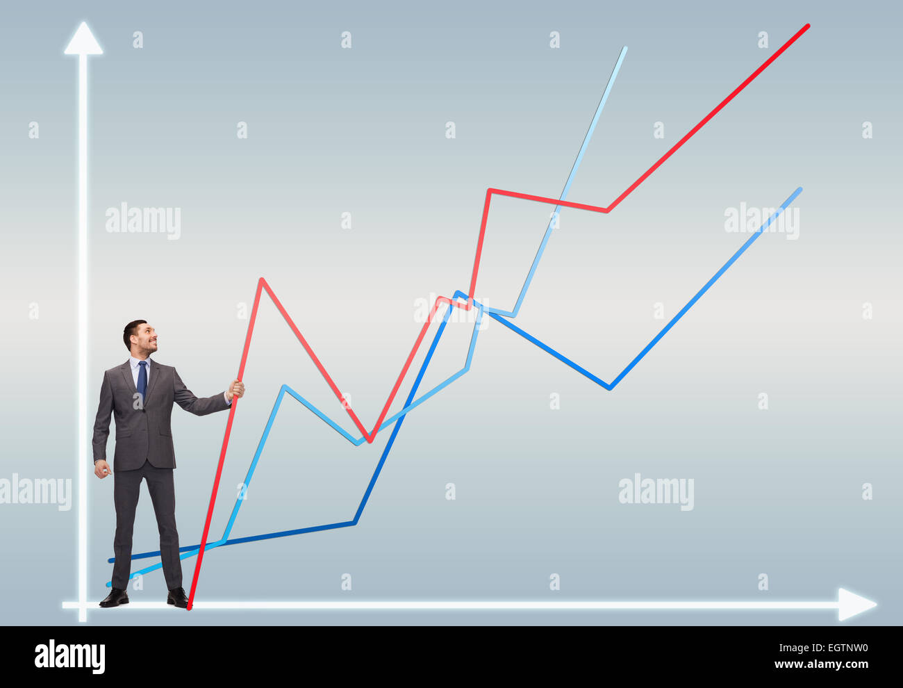 smiling man holding graph line Stock Photo - Alamy