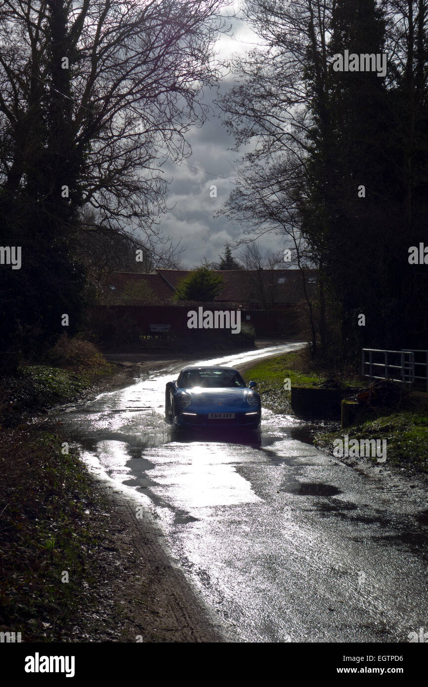 car water ford on country lane Stock Photo - Alamy