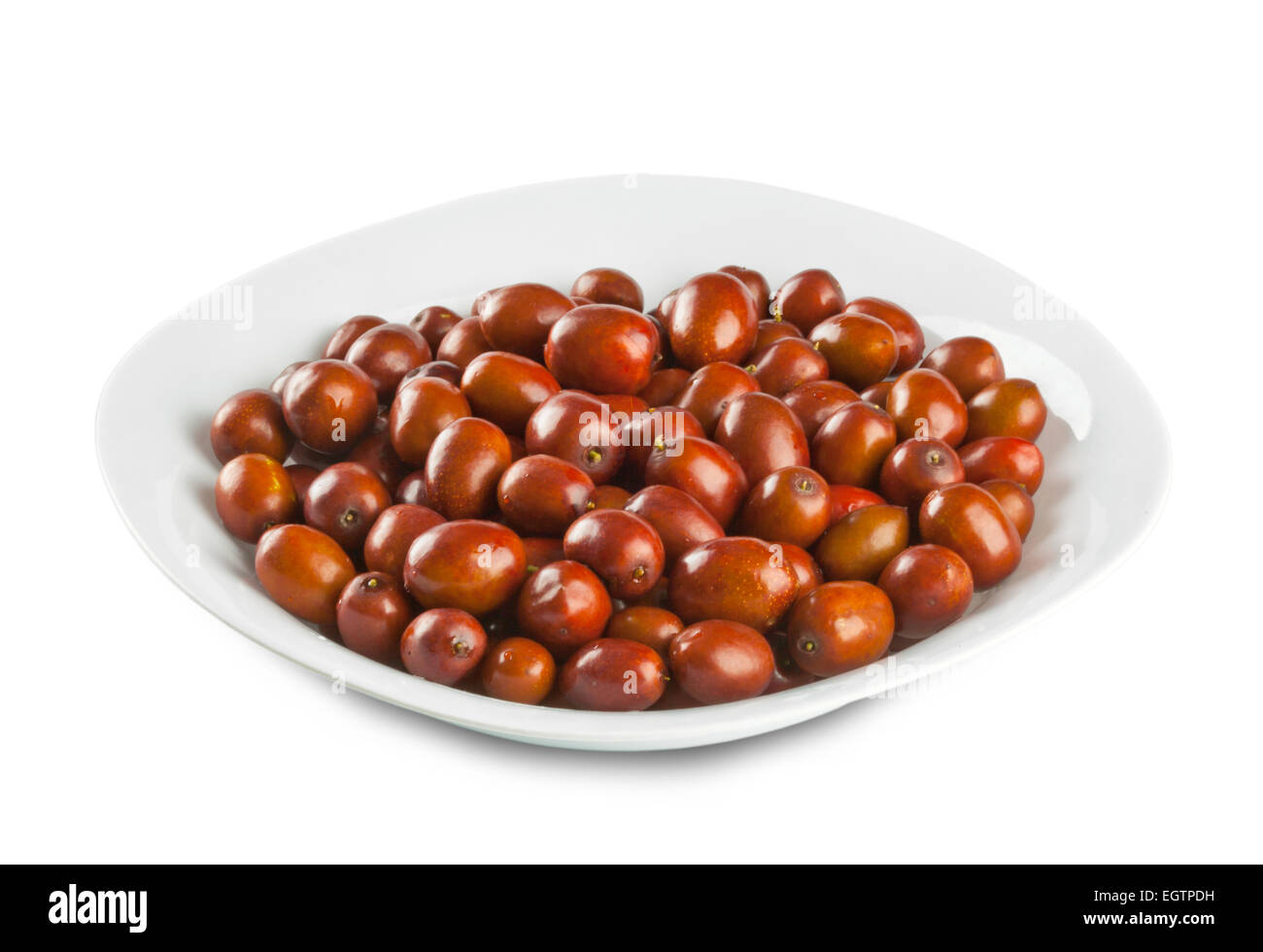 Plate of jujube isolated on white background Stock Photo - Alamy