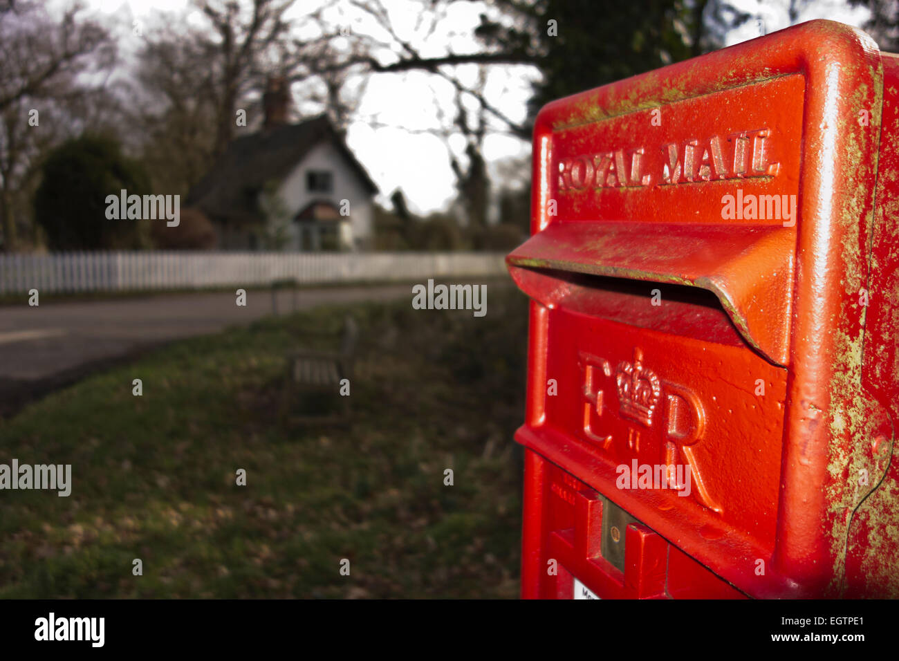 red Royal mail rural post box postal service Stock Photo - Alamy