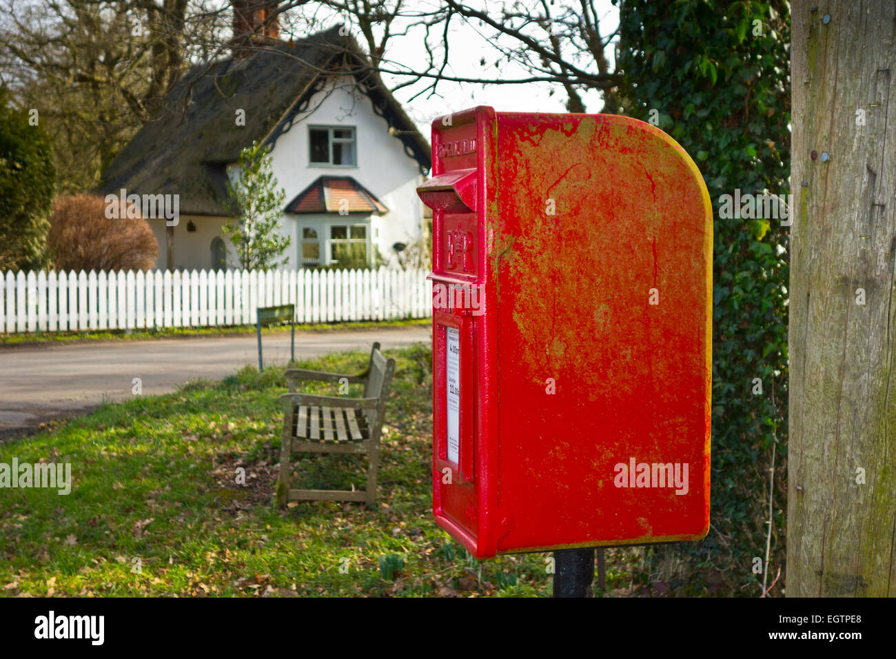 red Royal mail rural post box postal service Stock Photo - Alamy