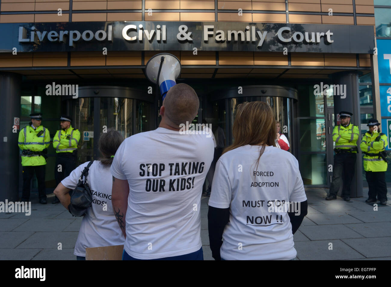 Parents protest against family courts outside Liverpool Civil and ...