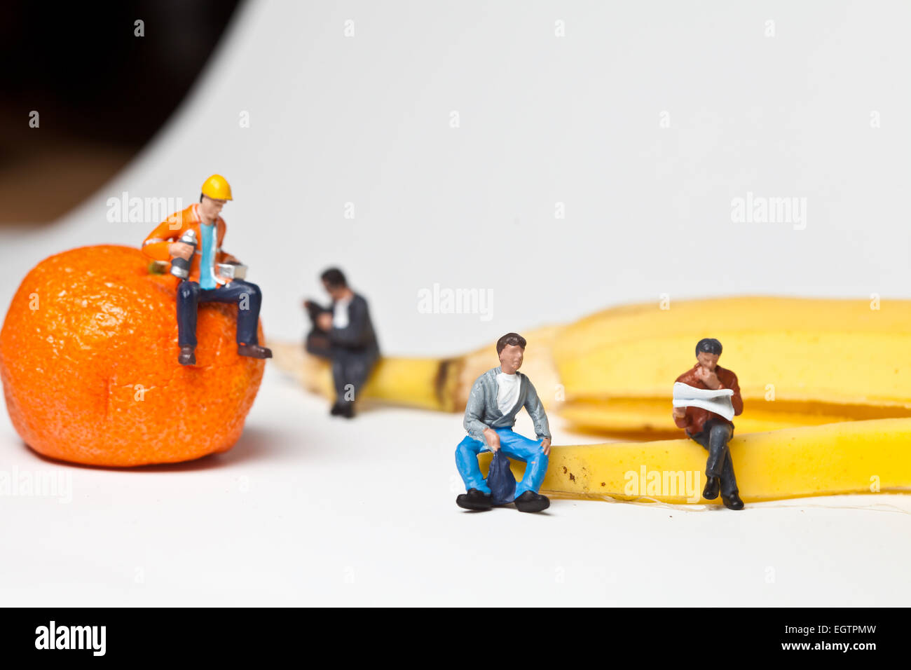 Miniature people in action in various situations Stock Photo - Alamy