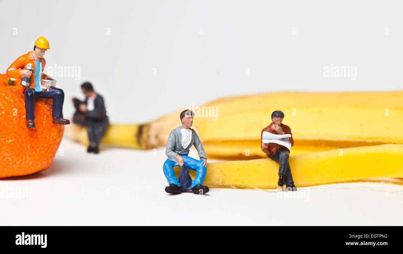 Miniature people in action in various situations Stock Photo - Alamy