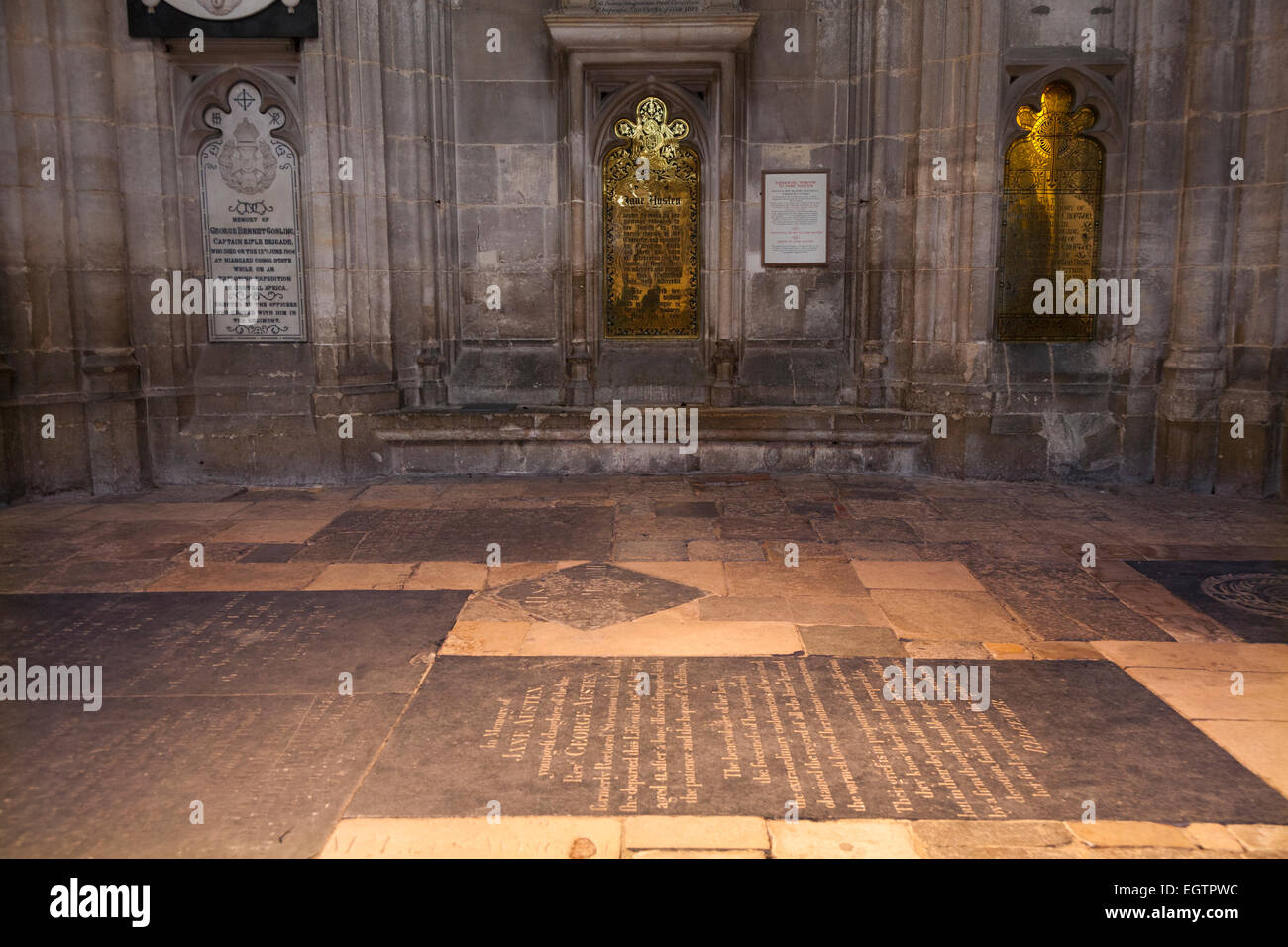 Jane Austen 's grave stone in foreground, and her later brass wall ...