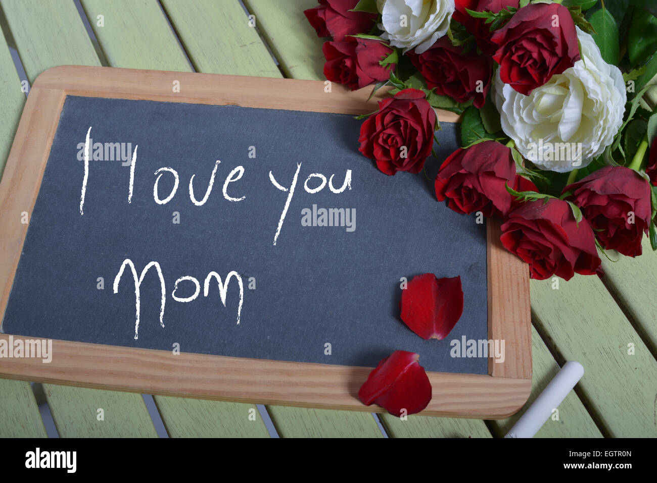writing I love you mom on the blackboard and some roses Stock Photo - Alamy