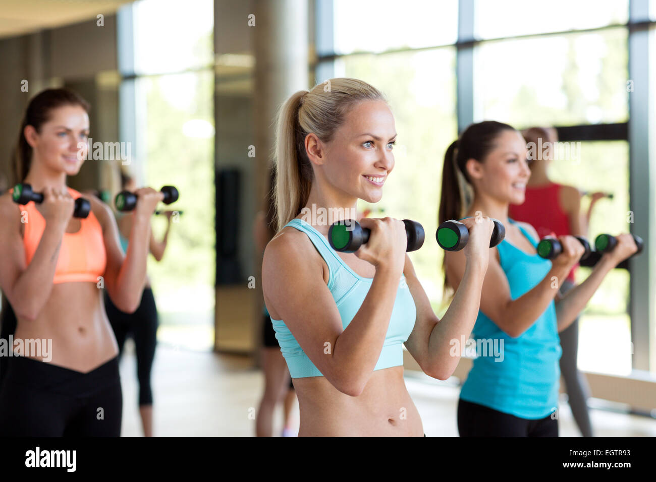 group of women with dumbbells in gym Stock Photo - Alamy