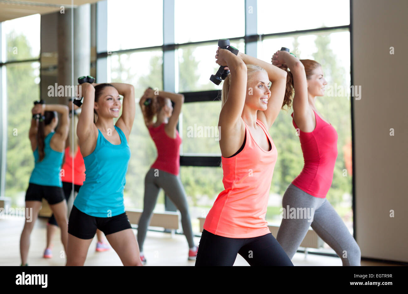 group of women with dumbbells in gym Stock Photo - Alamy
