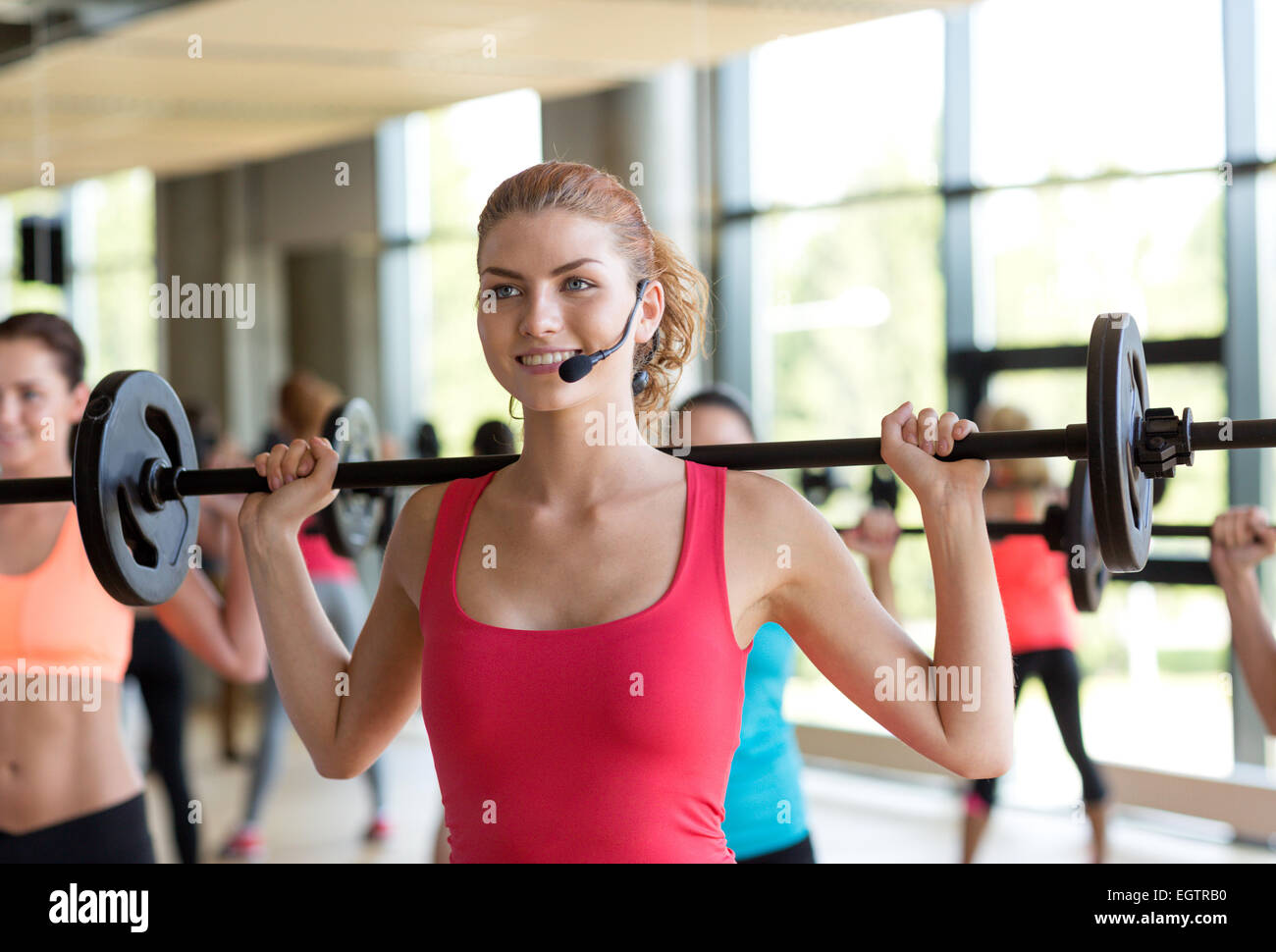 group of women with barbells in gym Stock Photo - Alamy