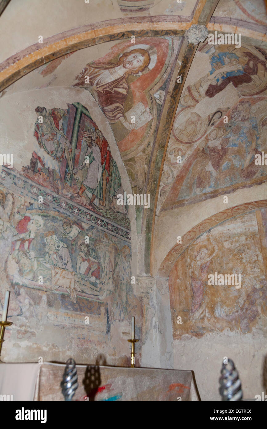 12th Century paintings show the Deposition and Entombment of Christ on ...