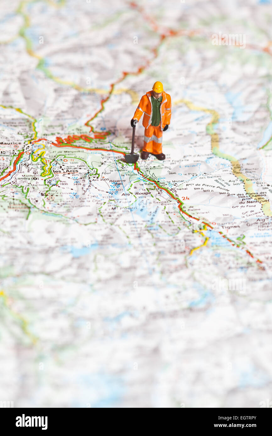Miniature people on a map Stock Photo - Alamy