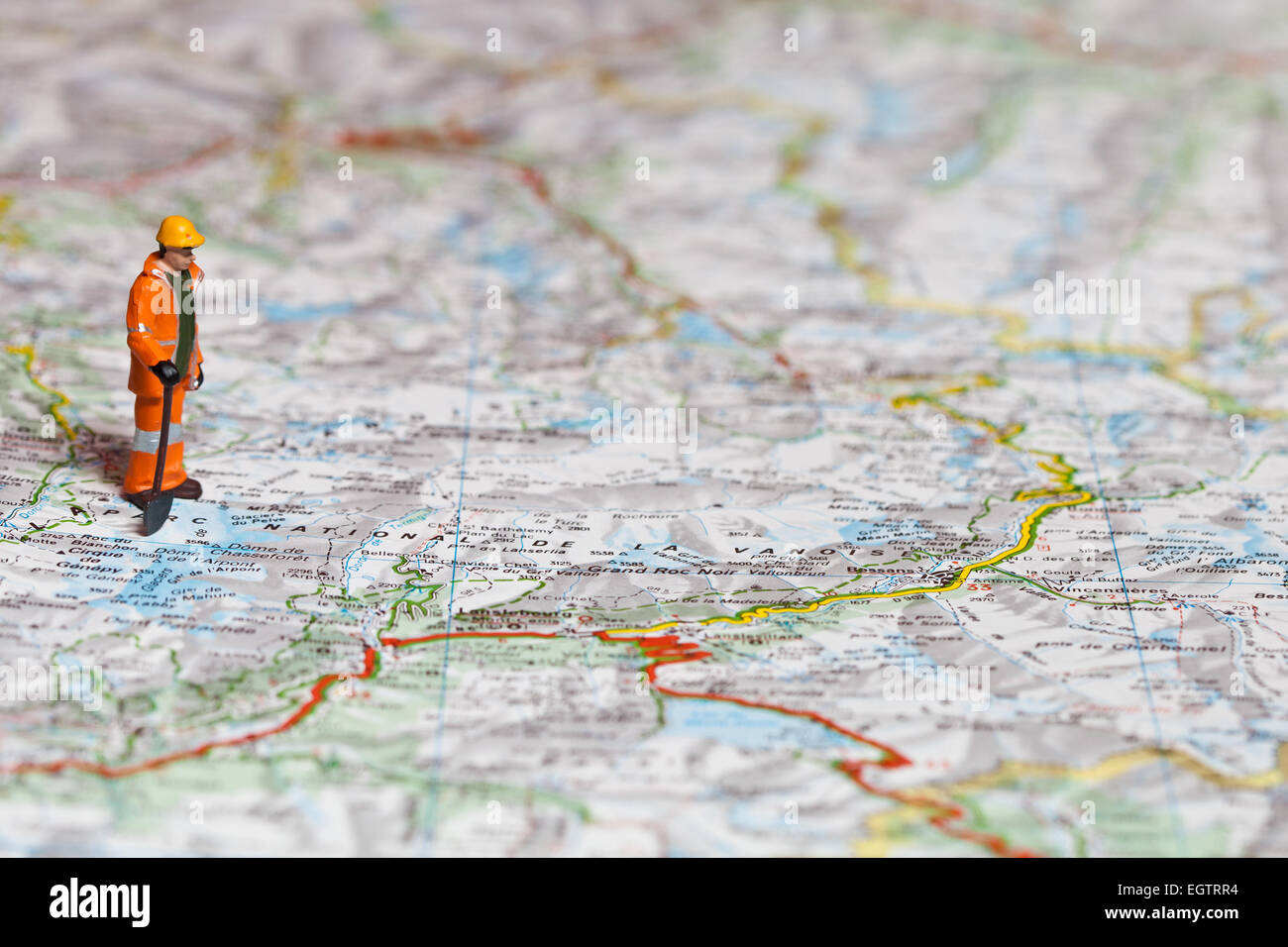 Miniature people on a map Stock Photo - Alamy