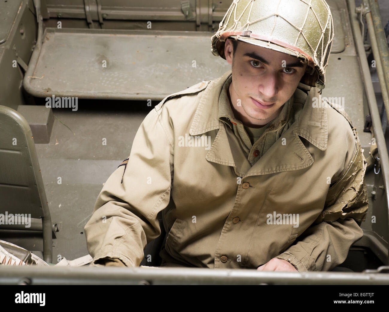 driver of a military vehicle of World War II with green helmet Stock ...