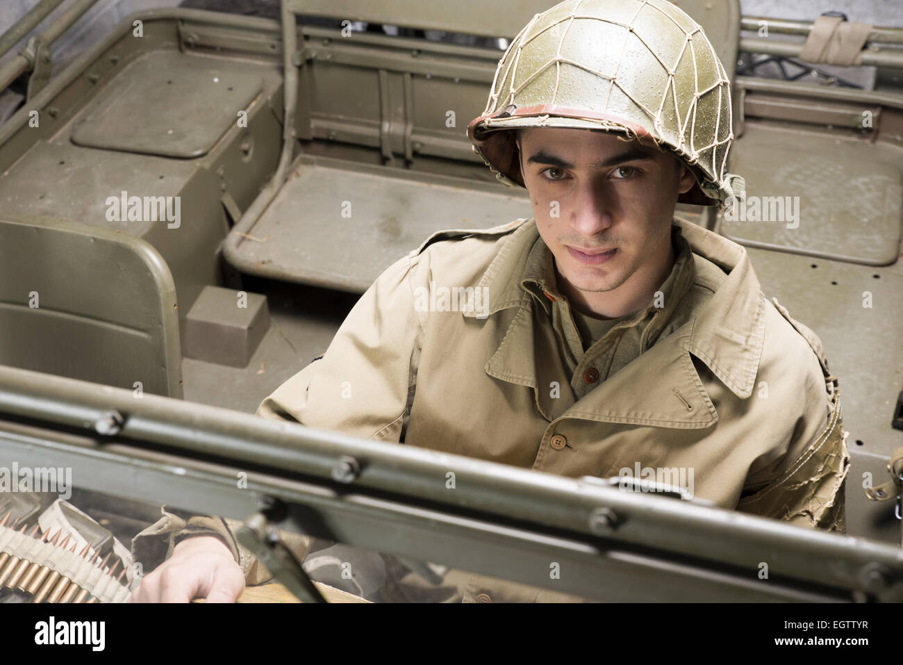 driver of a military vehicle of World War II with green helmet Stock ...