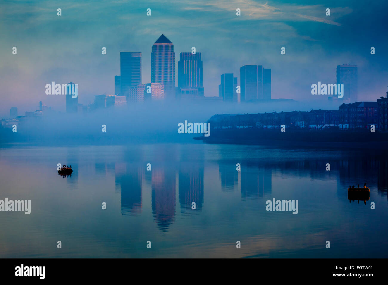 Canary Wharf In The Fog, London, England Stock Photo - Alamy
