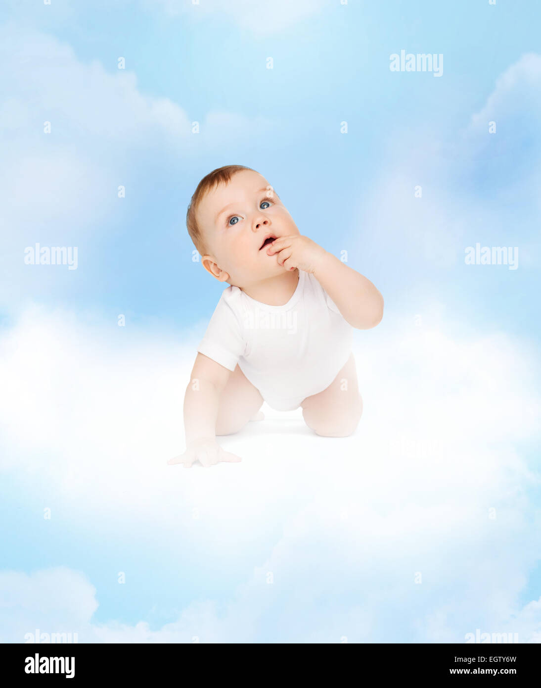 crawling curious baby looking up Stock Photo - Alamy