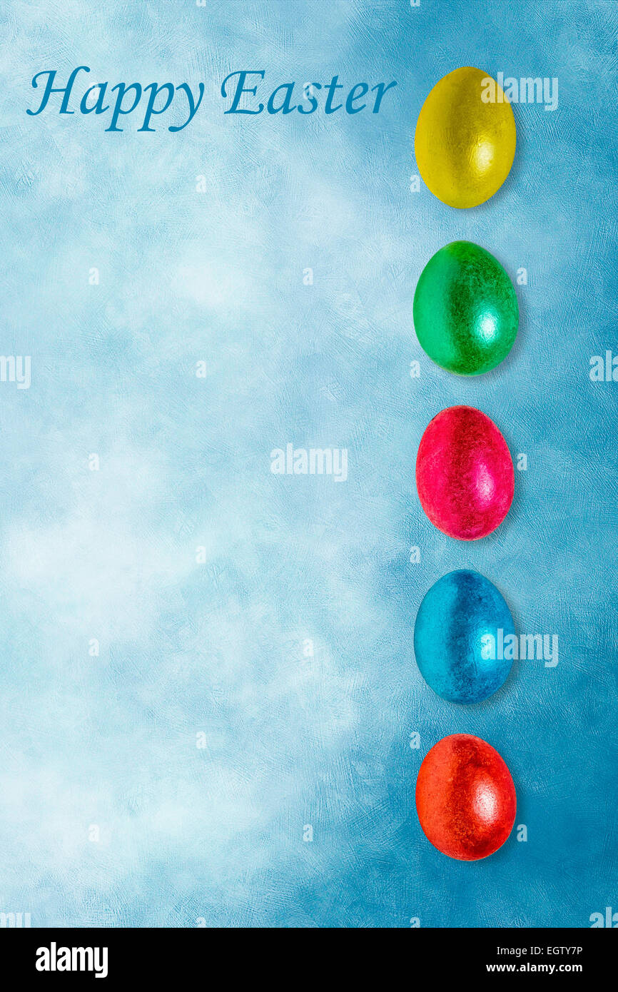 A line of colorful Easter eggs of red, blue, green, yellow and orange ...