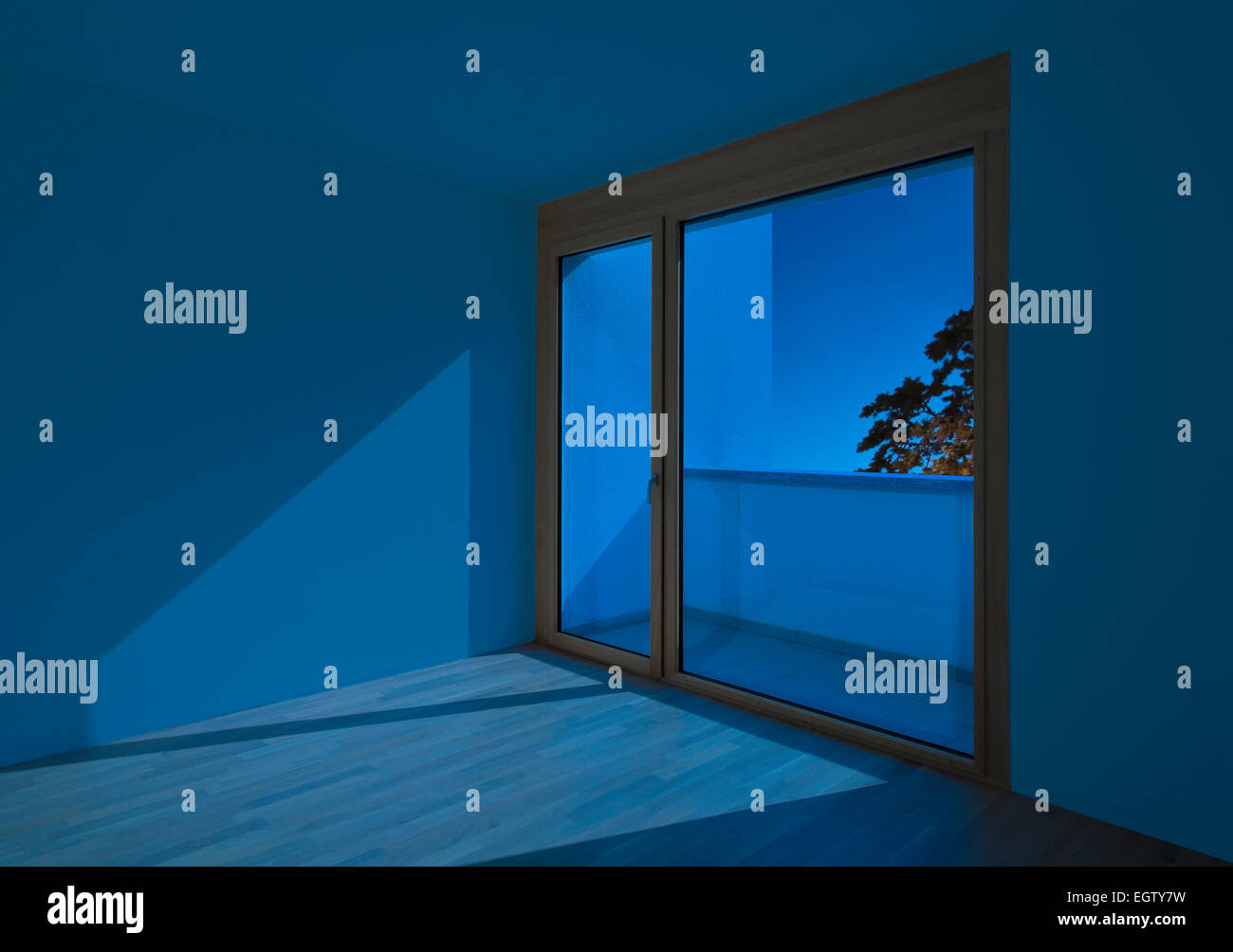 empty room with window by night Stock Photo - Alamy